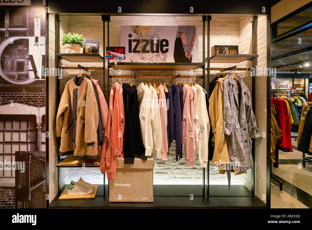 HONG KONG, CHINA - JANUARY 23, 2019: clothes on display at izzue store ...