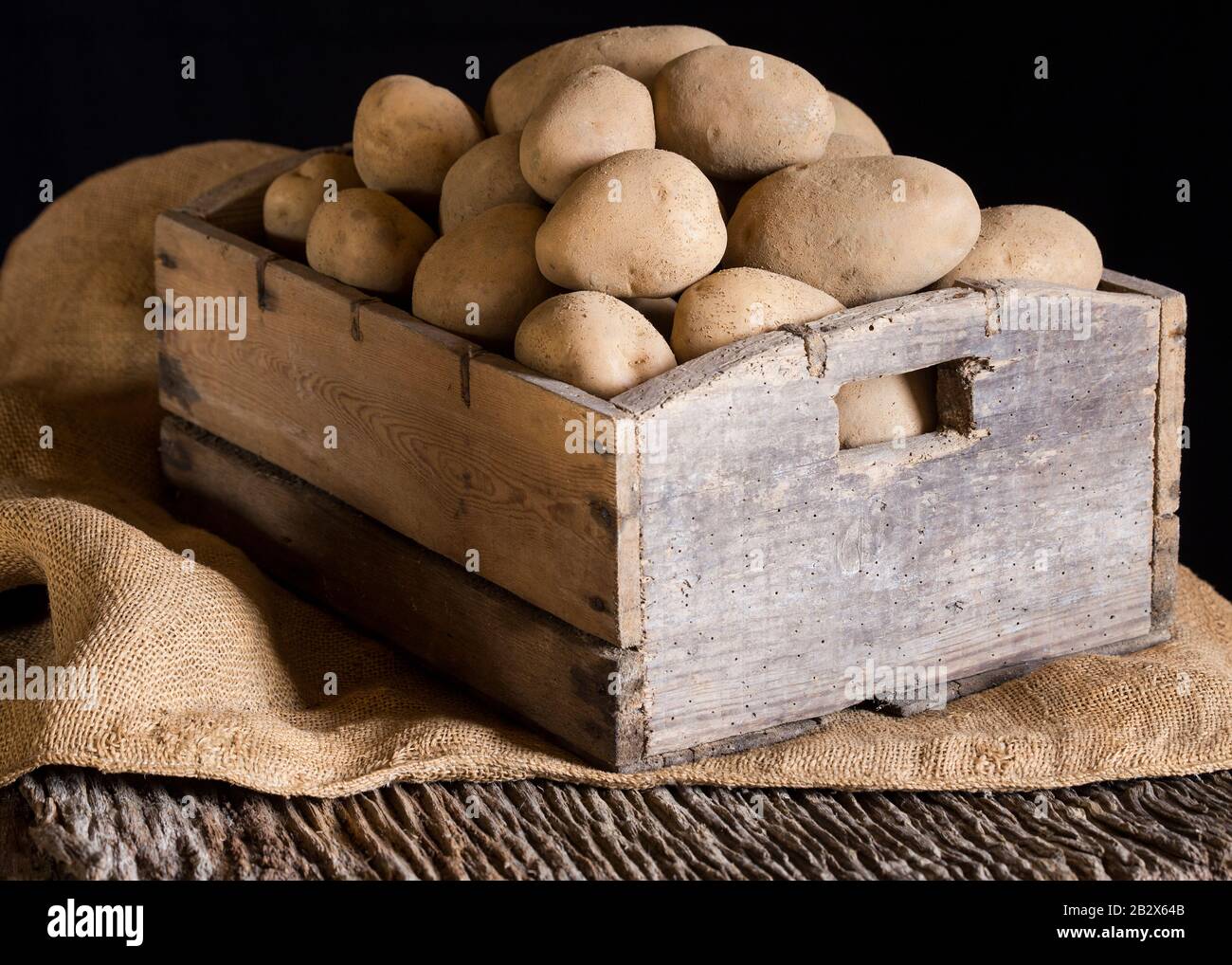 Production fresh potatoes in box hi-res stock photography and images ...