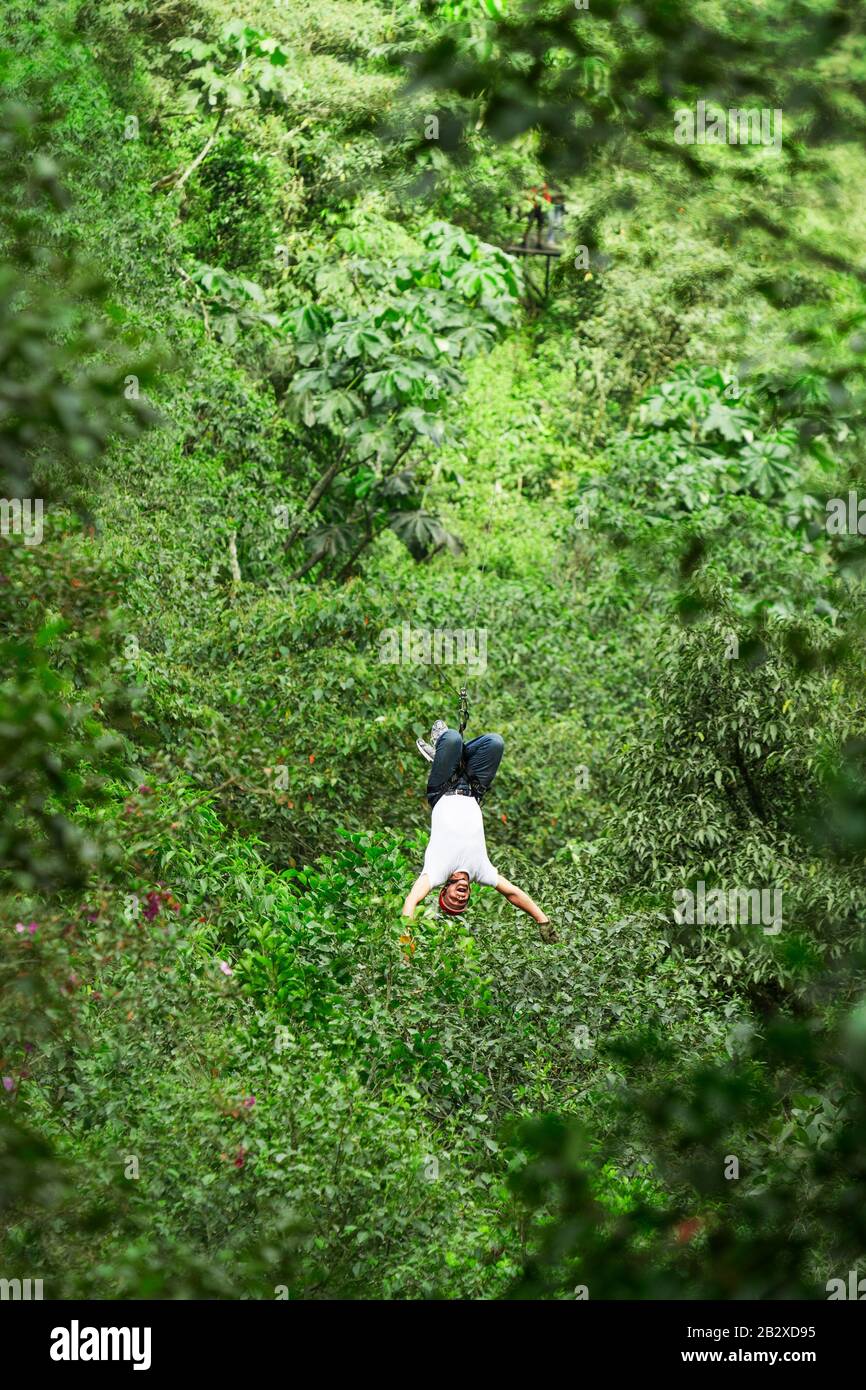 Adult Man Zipline Batman Position Ecuadorian Andes Stock Photo - Alamy