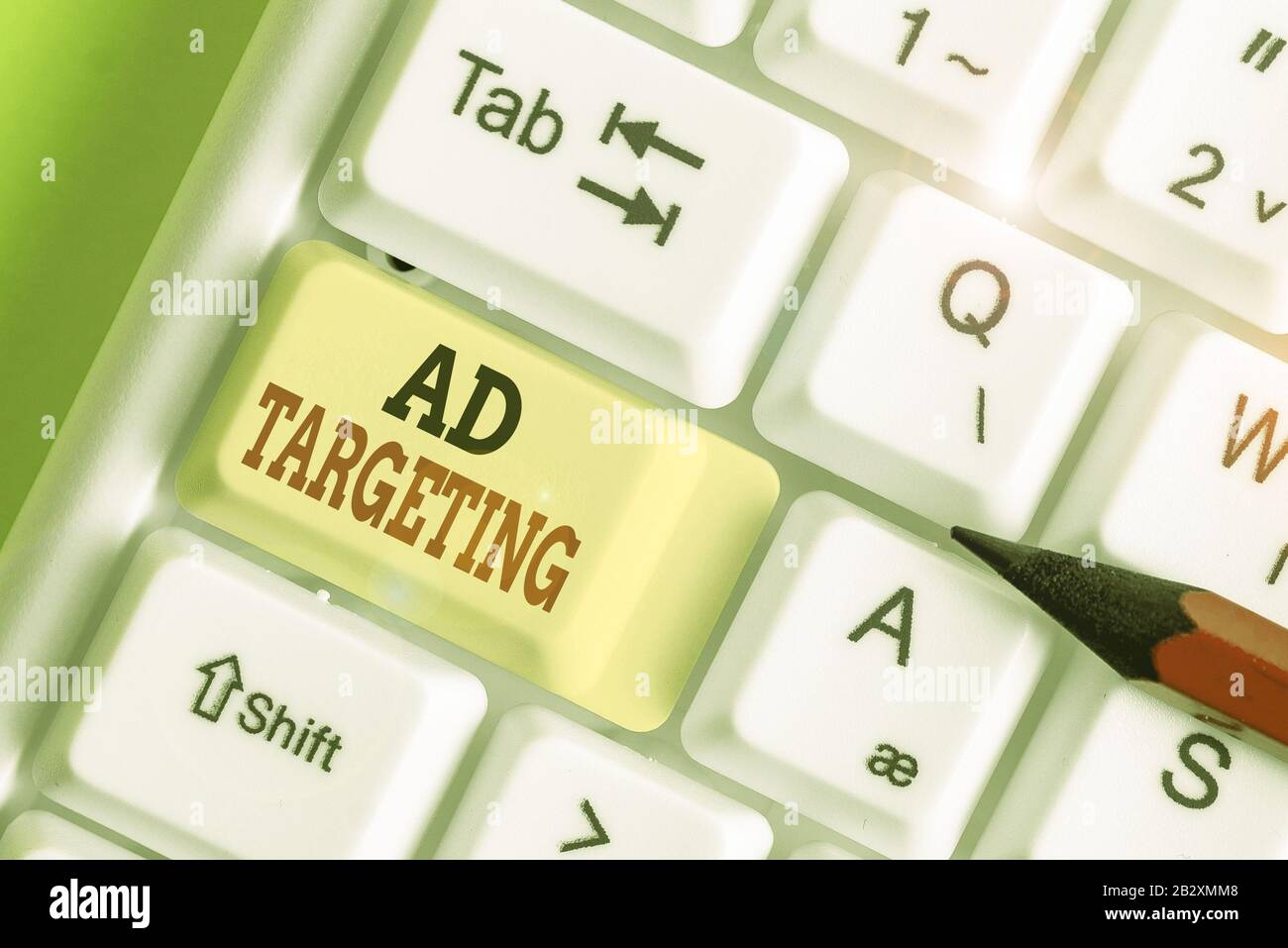 Writing note showing Ad Targeting. Business concept for target the most ...