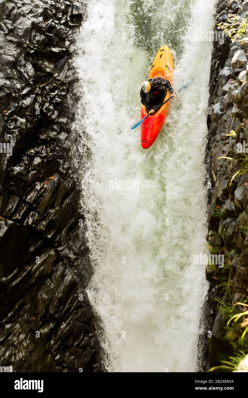 Courageous Kayaker In A Vertical Diving Position Stock Photo - Alamy