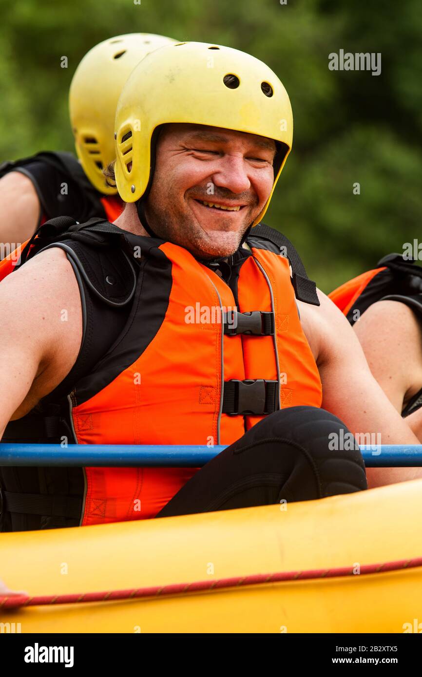Portrait Of Adult Man In White Water Rafting Boat Smiley Face Stock ...