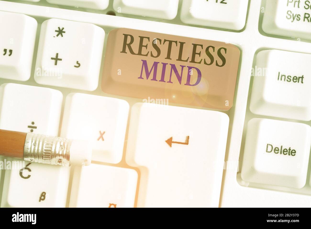 Writing note showing Restless Mind. Business concept for A ...