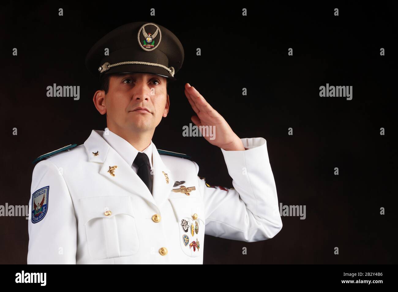 Ecuadorian Police Official Dressed Up In Formal Uniform Saluting Studio ...