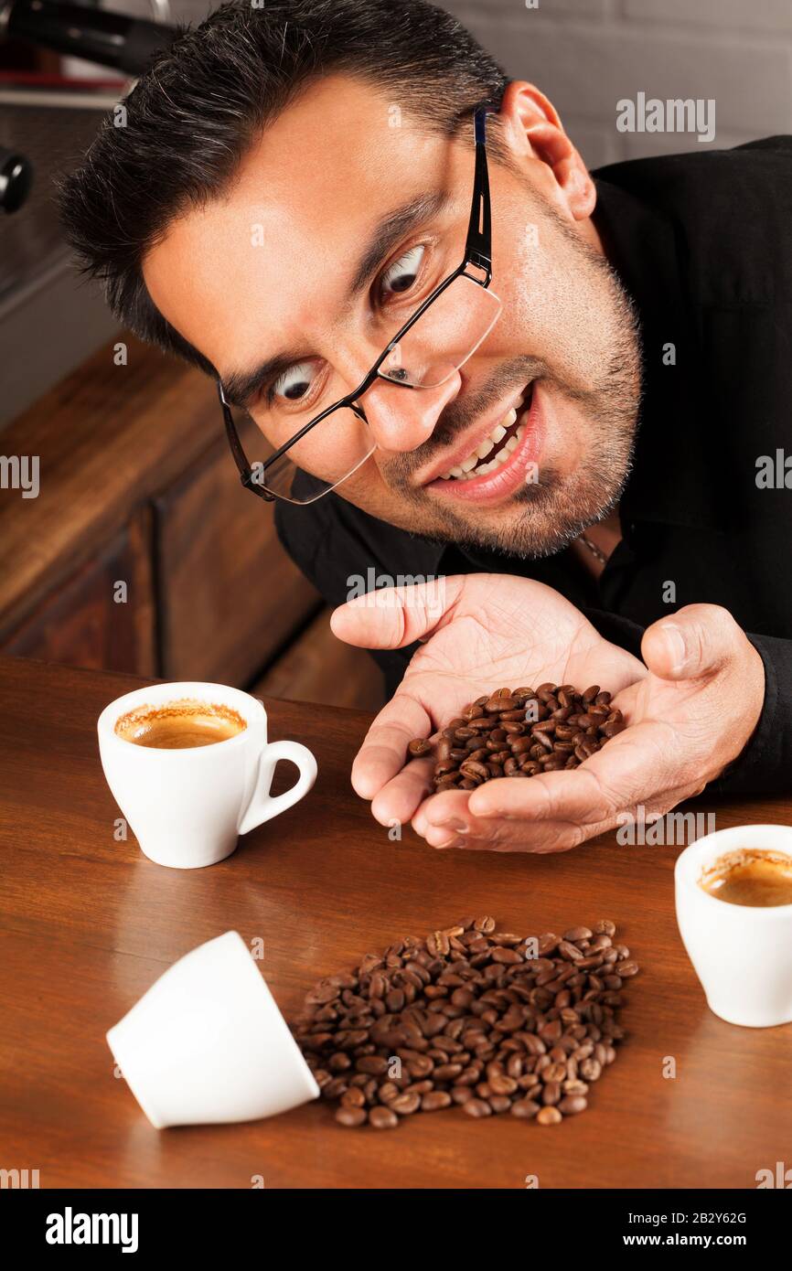 Coffee Sommelier Examining Roasted Beans Stock Photo - Alamy