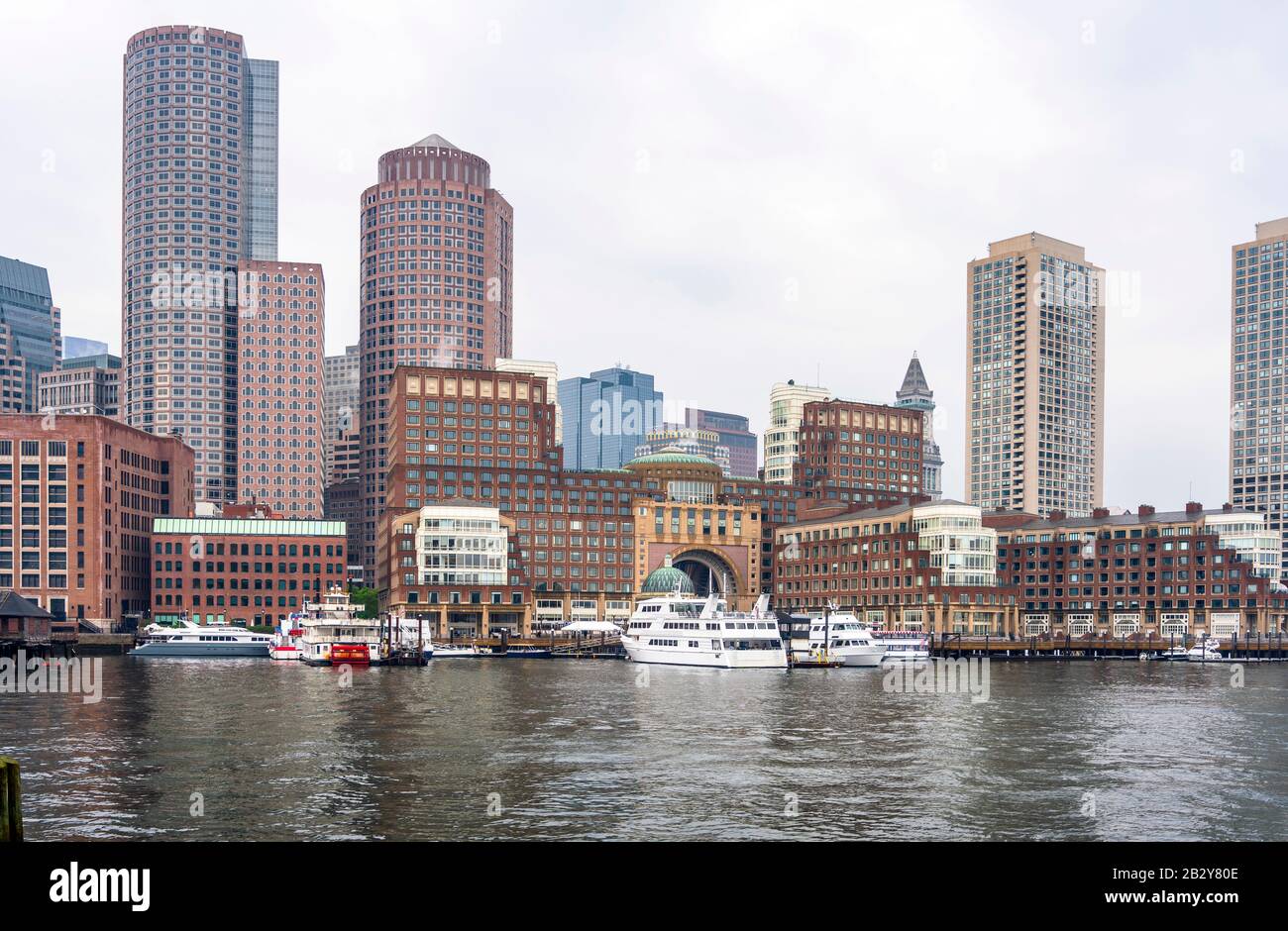 Ferries and other passenger ships are standing at the pier on the ...