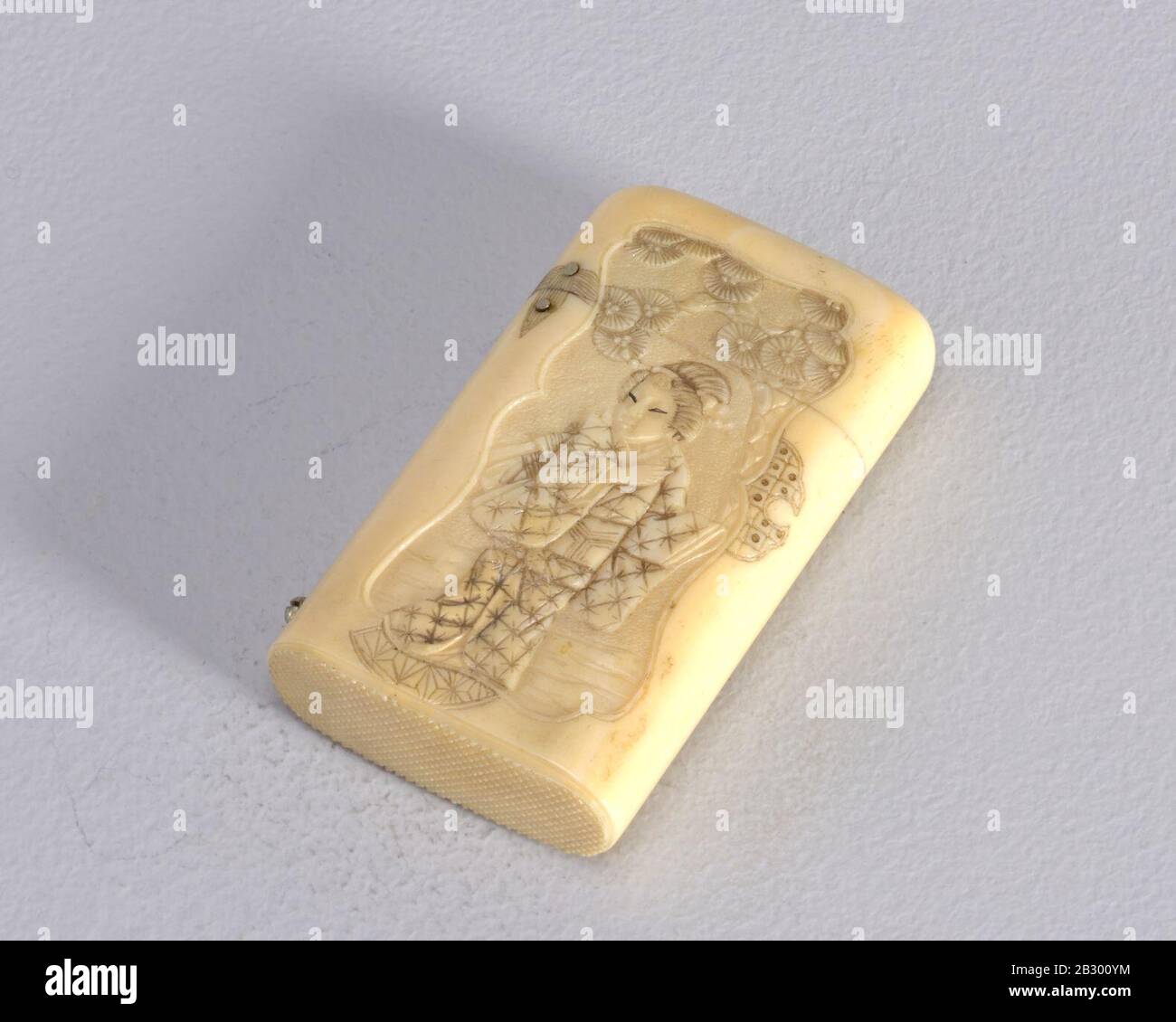 Geisha Holding Fish on Platter Matchsafe, late 19th century Stock Photo ...