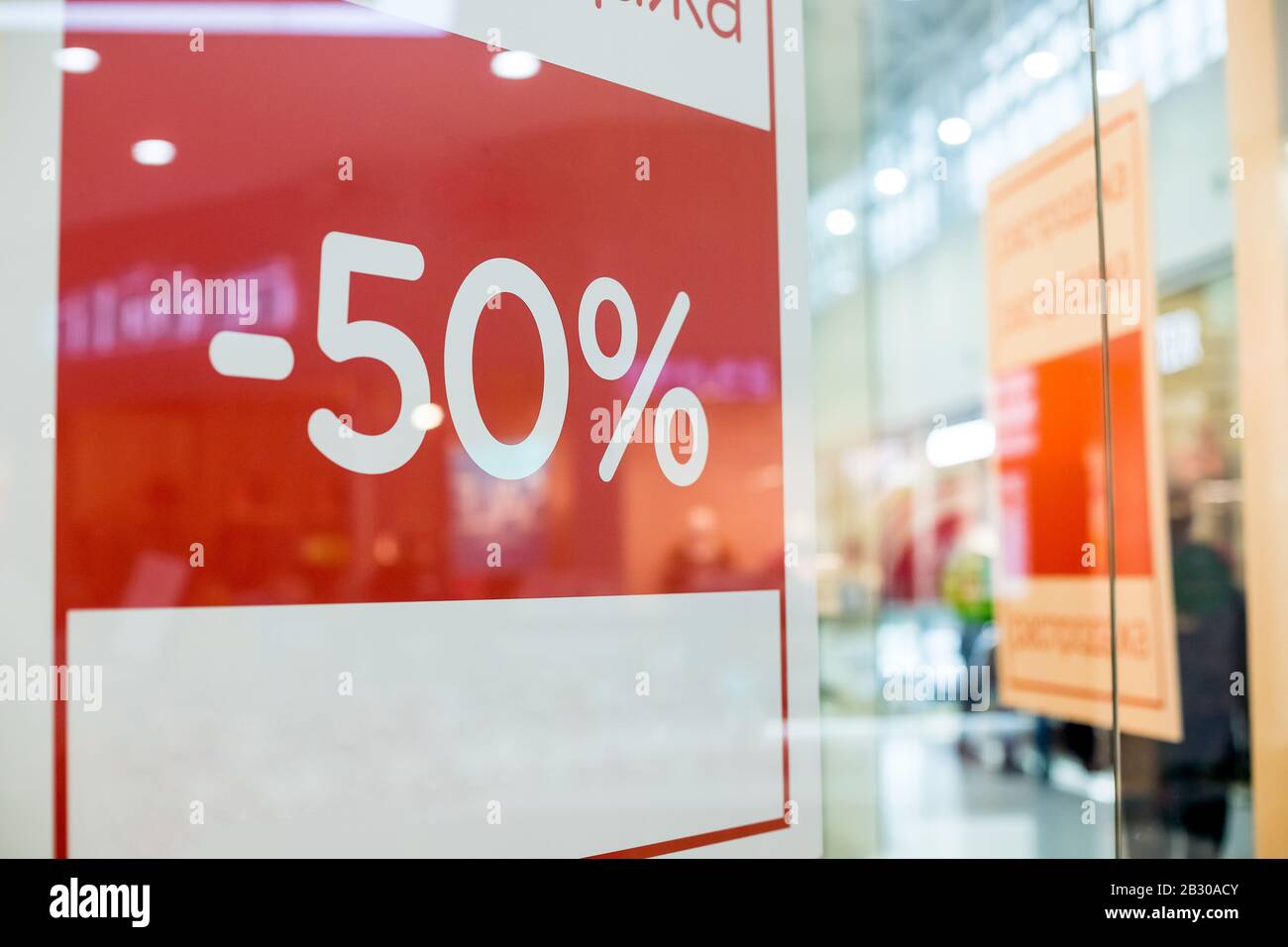 Retail Image Of A Sale Sign In A Clothing Store Window.shopping sale ...