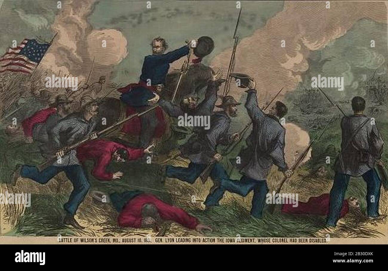 Gen. Lyon leading into action the Iowa Regiment whose colonel had been ...
