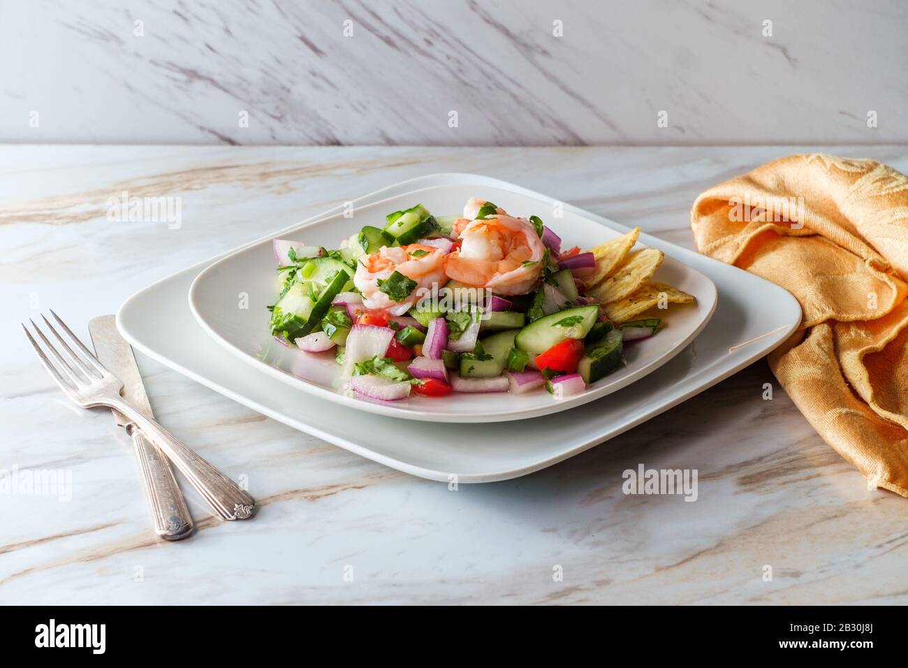 Chilled spicy Peruvian ceviche with shrimp and plantain banana chips ...