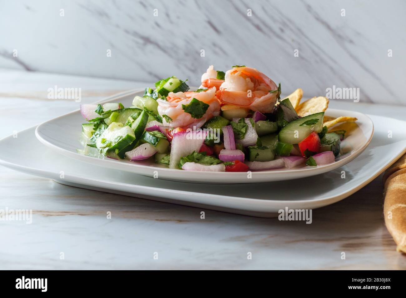 Chilled spicy Peruvian ceviche with shrimp and plantain banana chips ...