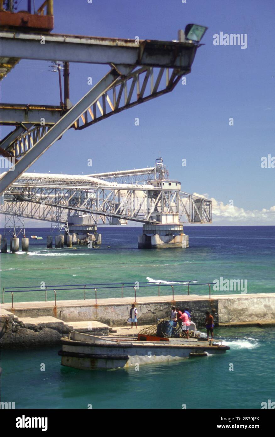 Gilbertese [I-Kiribati] seamen manoeuvre the harbour launches on Nauru ...
