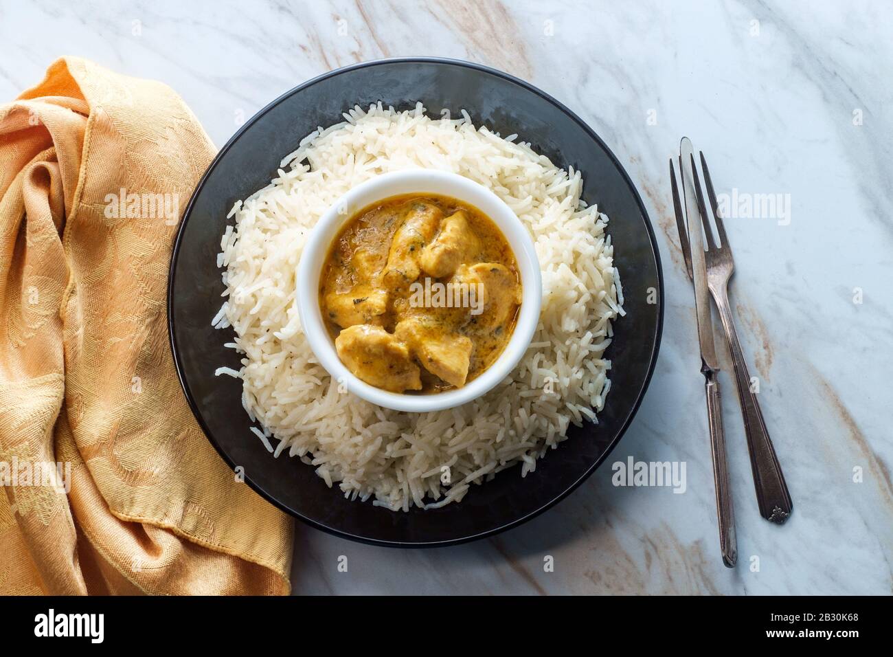 Authentic Indian chicken korma curry with jasmine rice Stock Photo - Alamy
