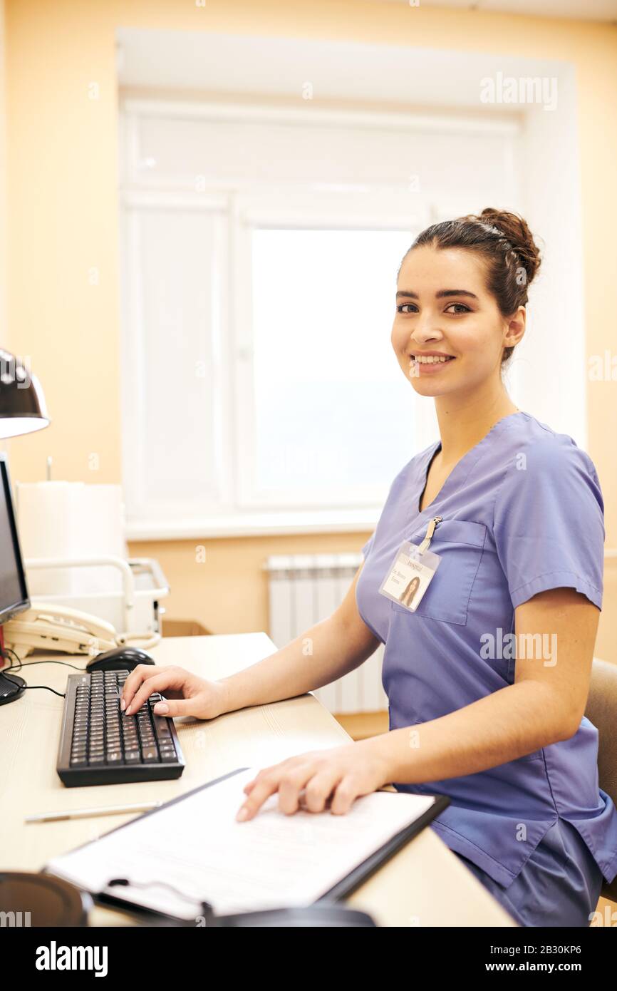 Nurse Taking A Test Computer