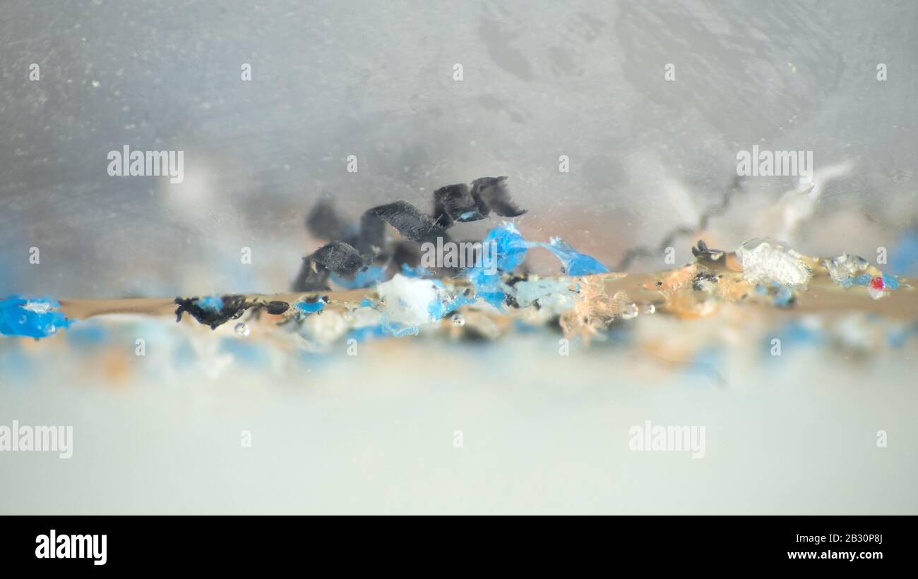 Plastic gets into water basin and gradually destroyed by waves and sun ...