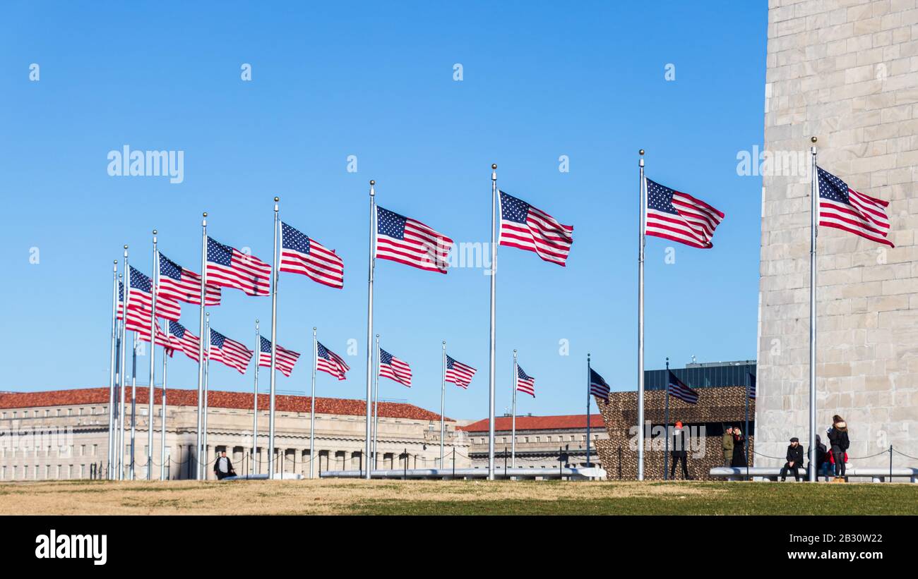 American flags at the base of the washington monument hi-res stock ...