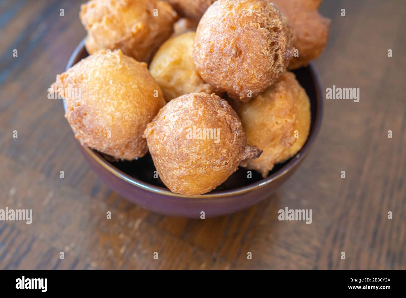Bowl full of Nigerian buns ready to eat Stock Photo - Alamy