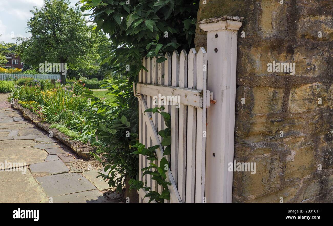 Colonial Village Gate Courtyard Event Stock Photo - Alamy
