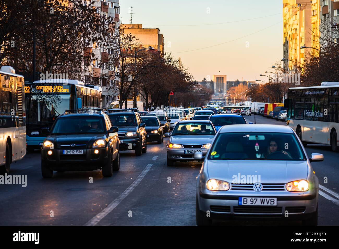 Car traffic at rush hour in downtown area of the city. Car pollution ...