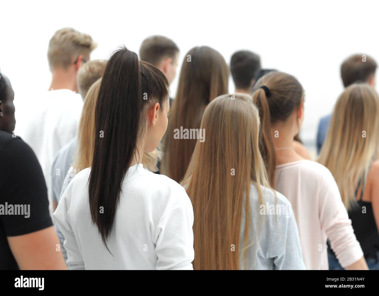 close up. different young people standing together Stock Photo - Alamy