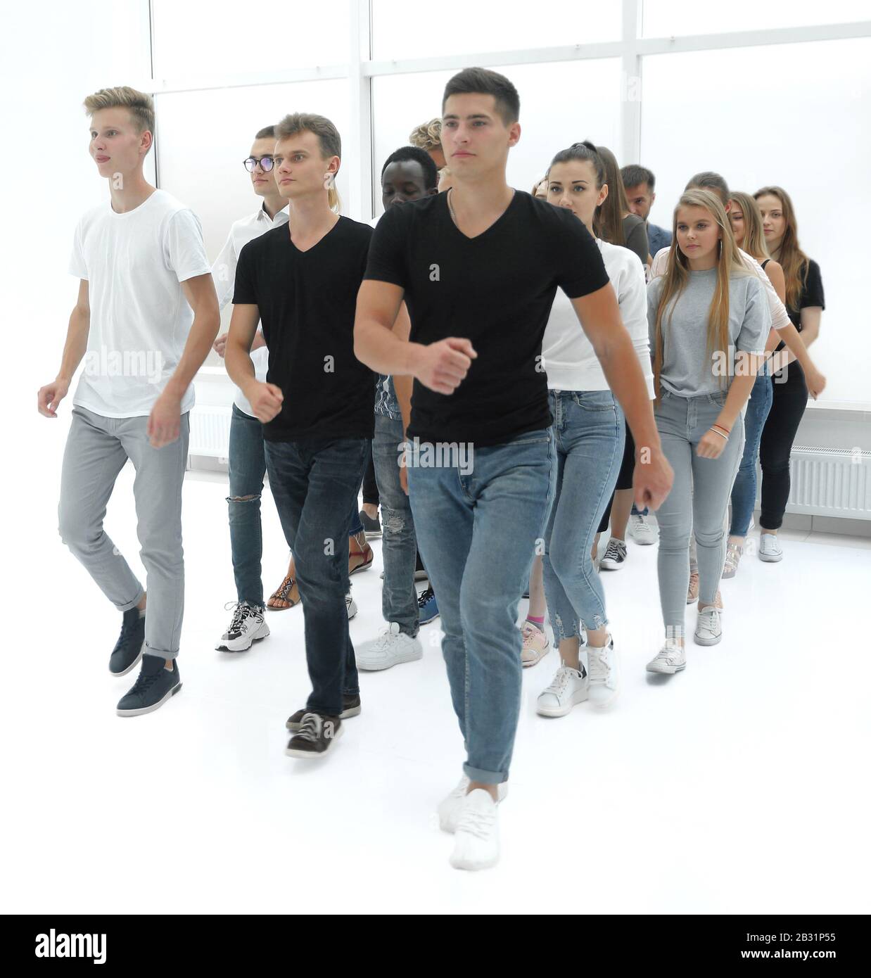 close up. different young people standing together Stock Photo - Alamy