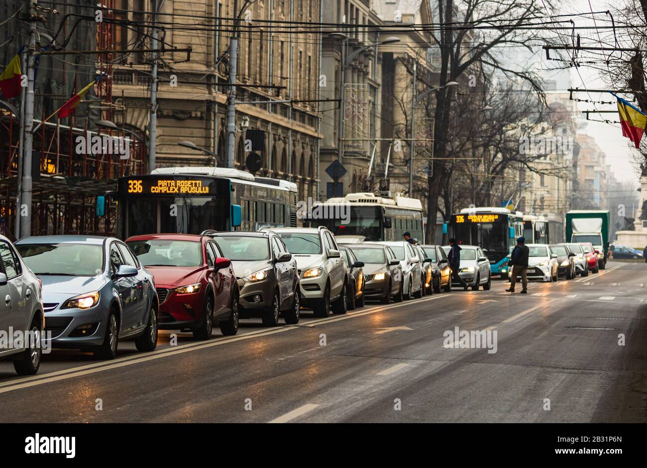Car traffic at rush hour in downtown area of the city. Car pollution ...