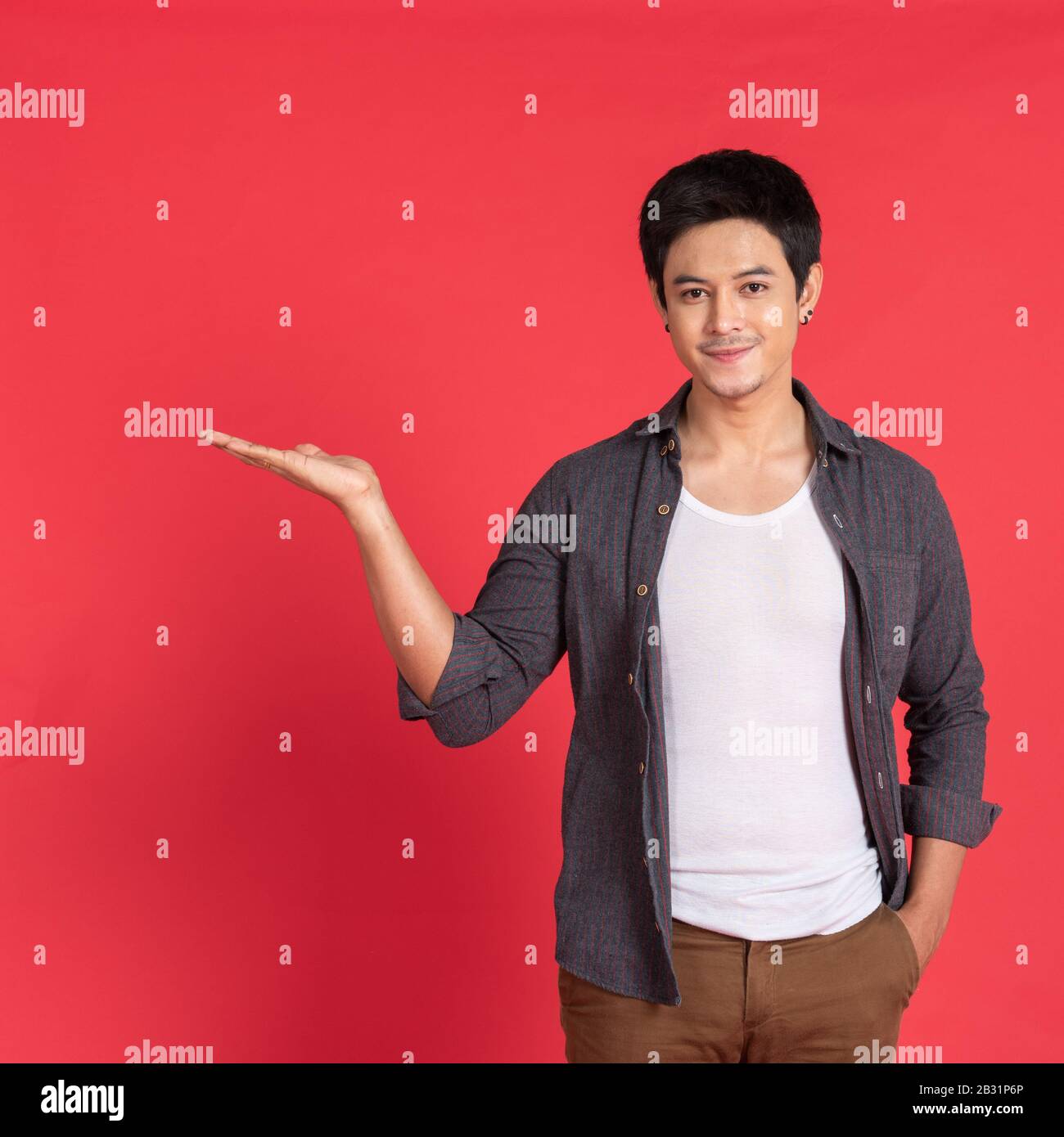 Handsome welcoming man smiling isolated hi-res stock photography and ...