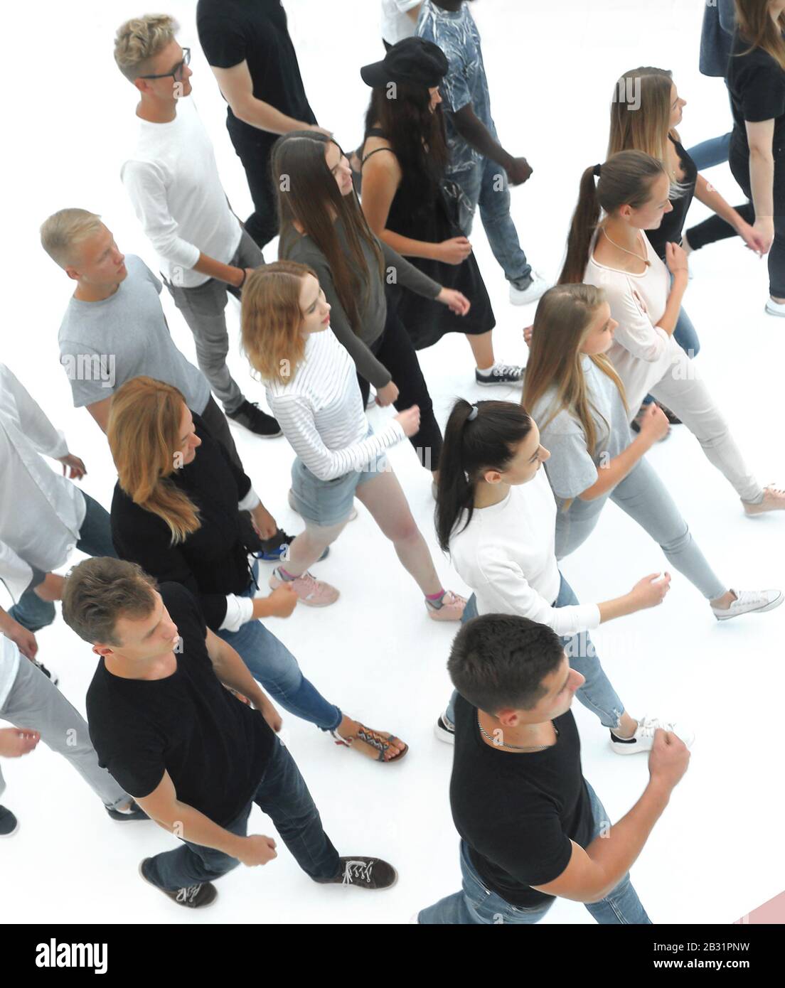 top view. an organized group of young people stepping forward Stock ...
