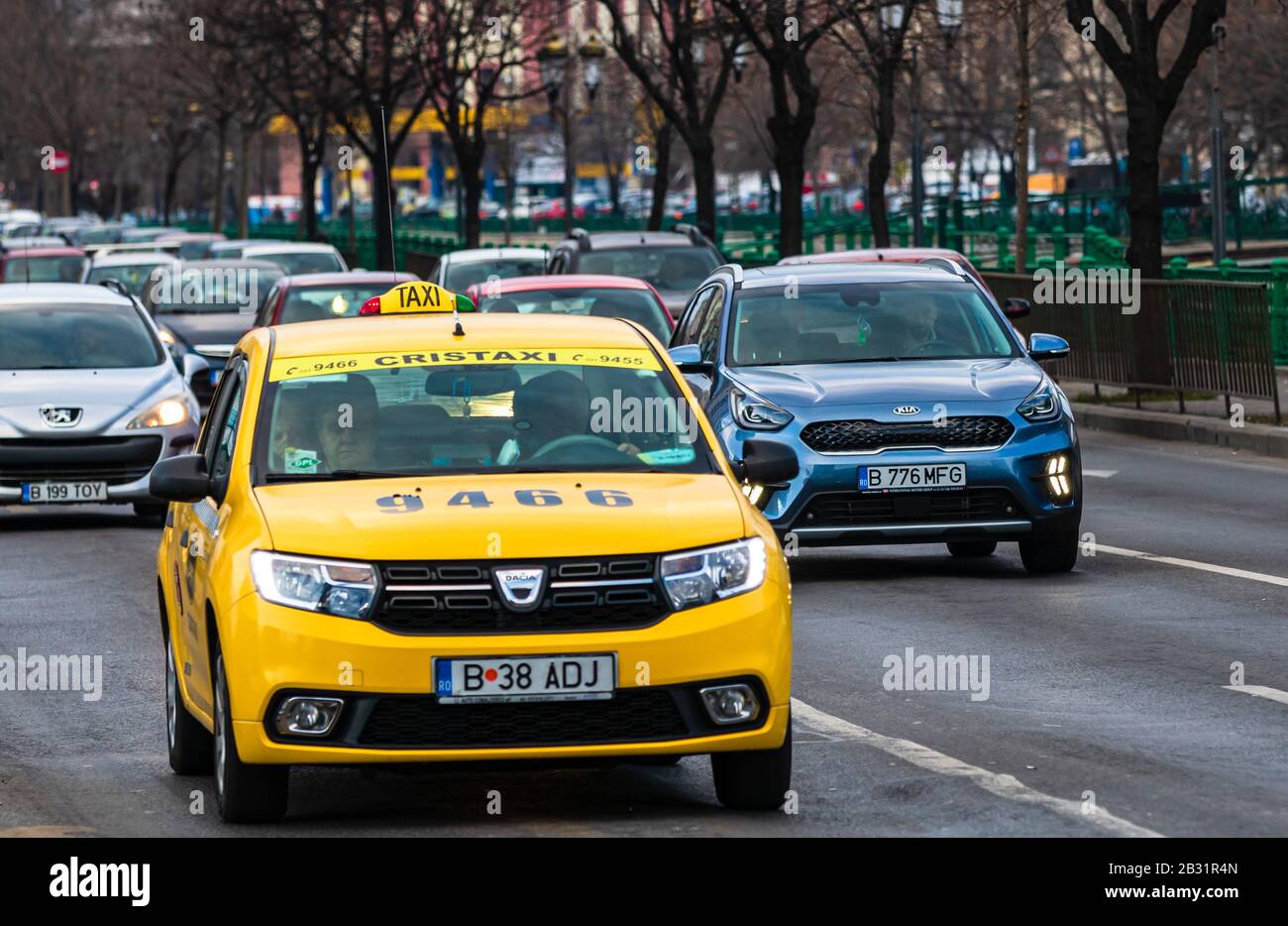 Car traffic at rush hour in downtown area of the city. Car pollution ...