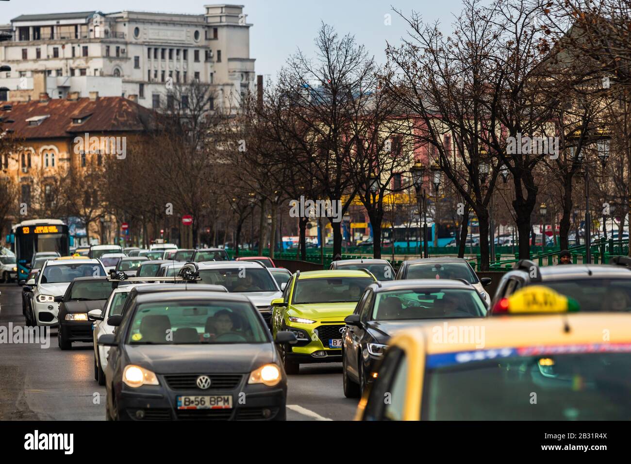 Car traffic at rush hour in downtown area of the city. Car pollution ...