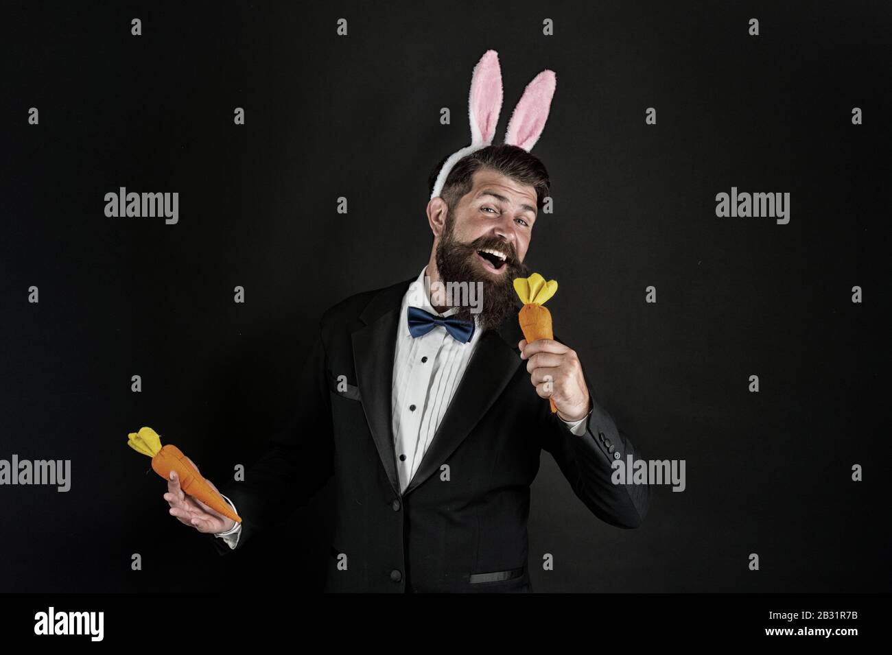 Feel the song. Easter singer. Businessman pretend singing with carrot ...