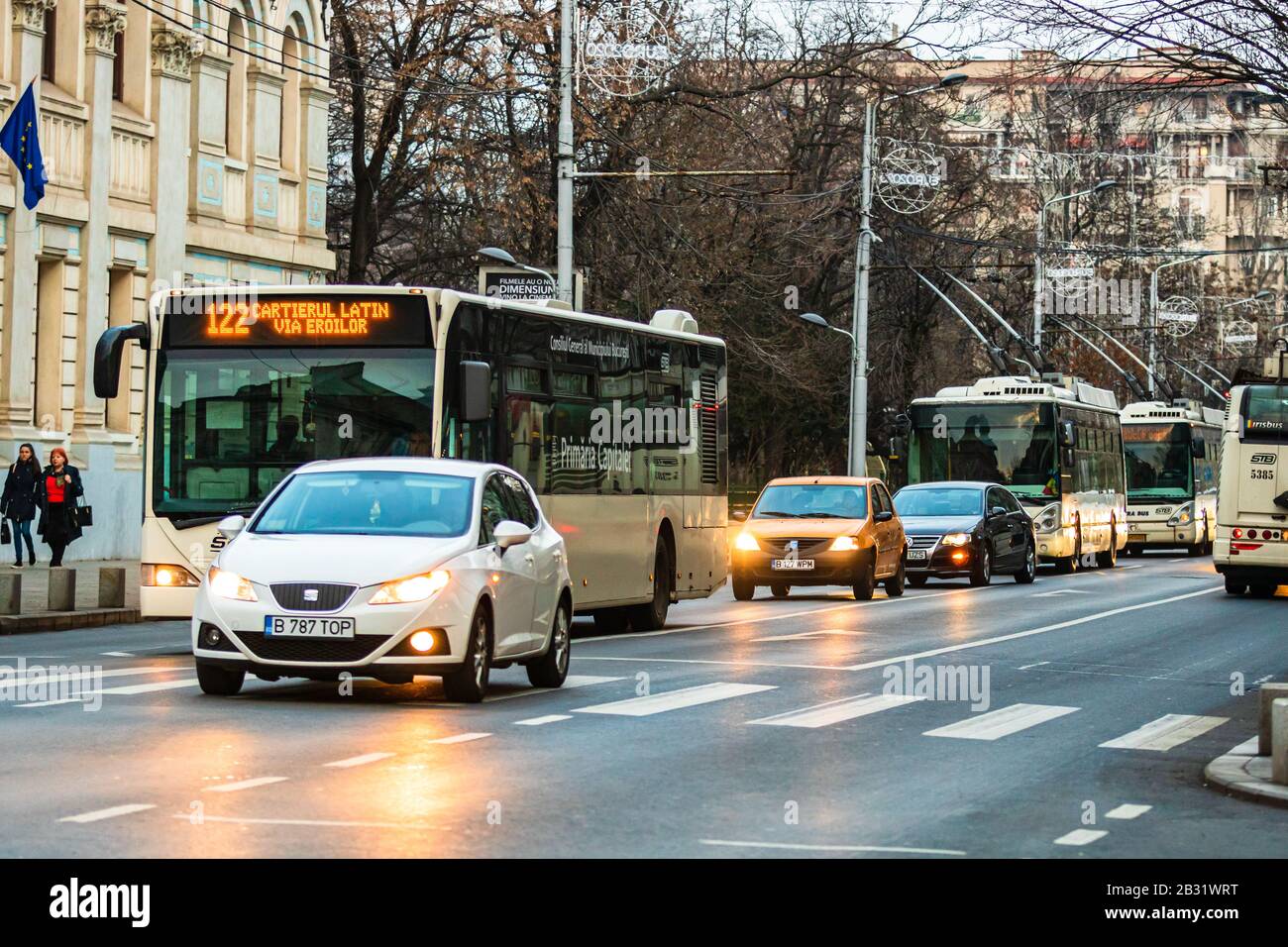 Car traffic at rush hour in downtown area of the city. Car pollution ...