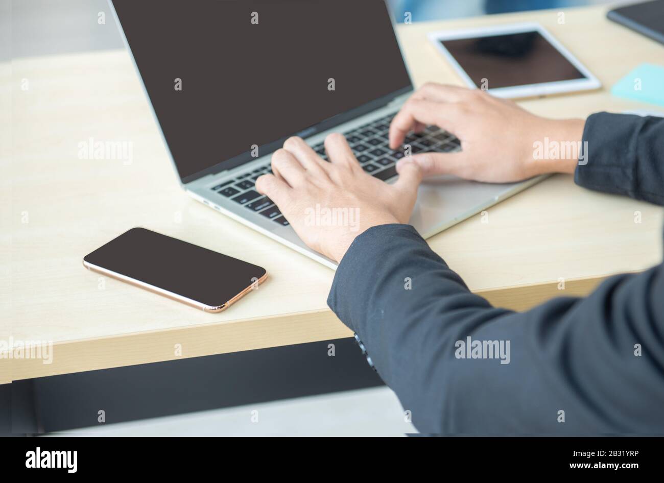Asian business man hands typing on laptop computer keyboard with ...