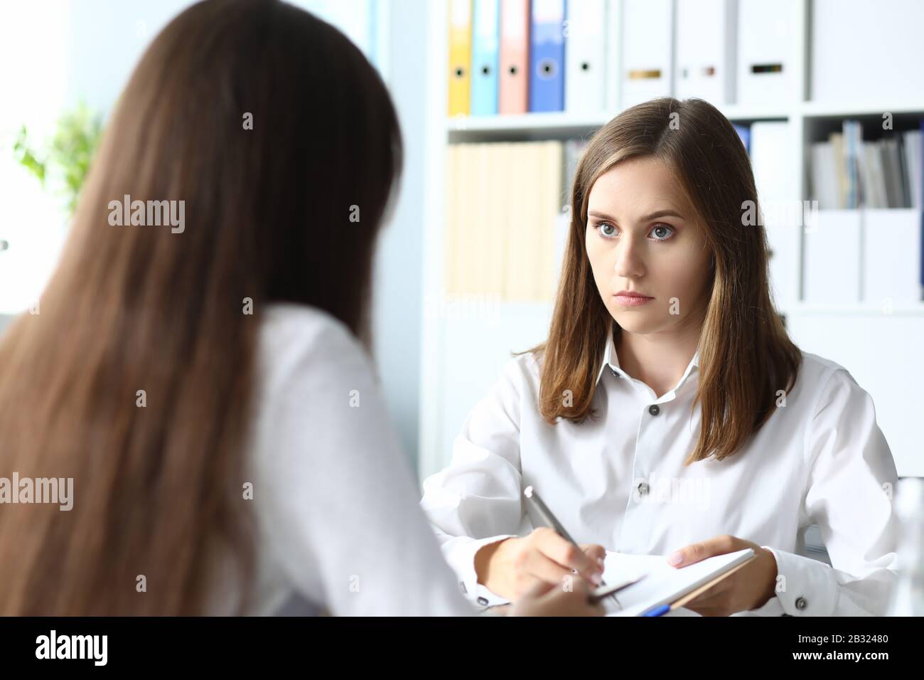 Client concerned hi-res stock photography and images - Alamy