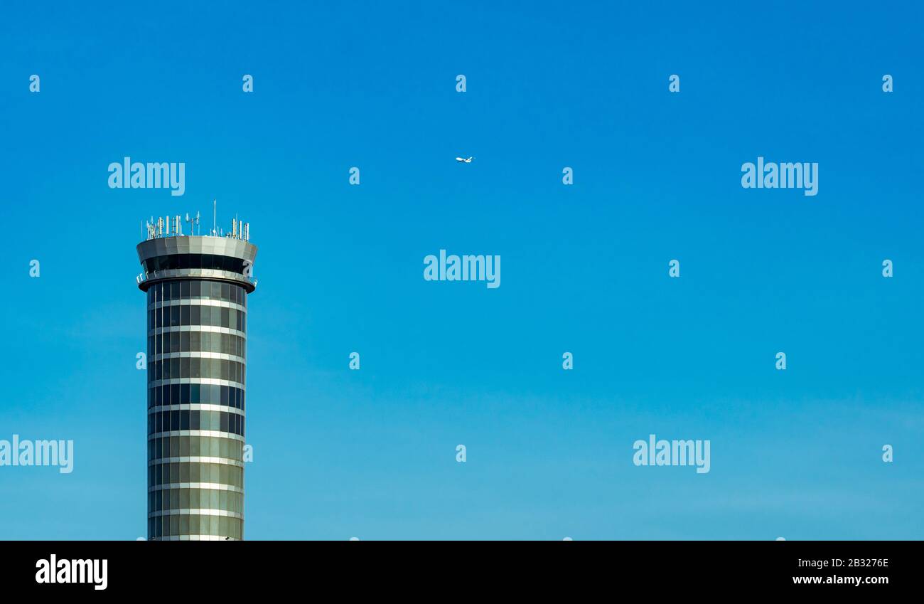 Air traffic control tower in the airport with international flight ...