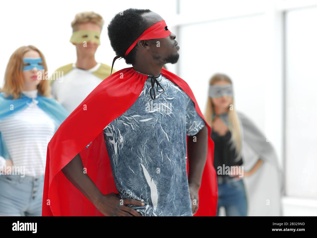 guy in red superhero Cape looking up Stock Photo - Alamy
