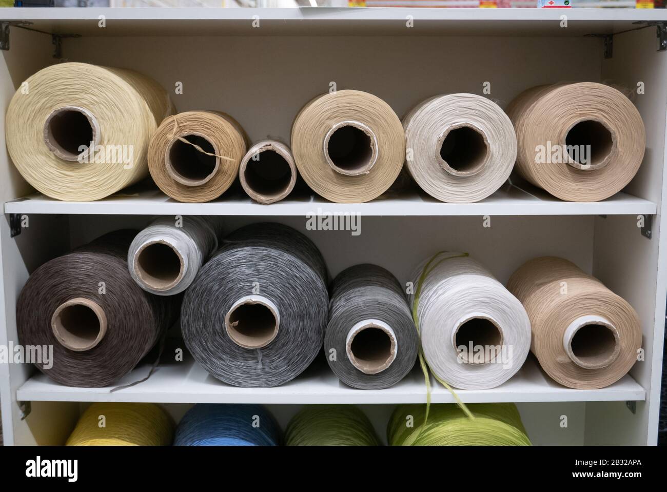 Stack of cotton reels hi-res stock photography and images - Alamy