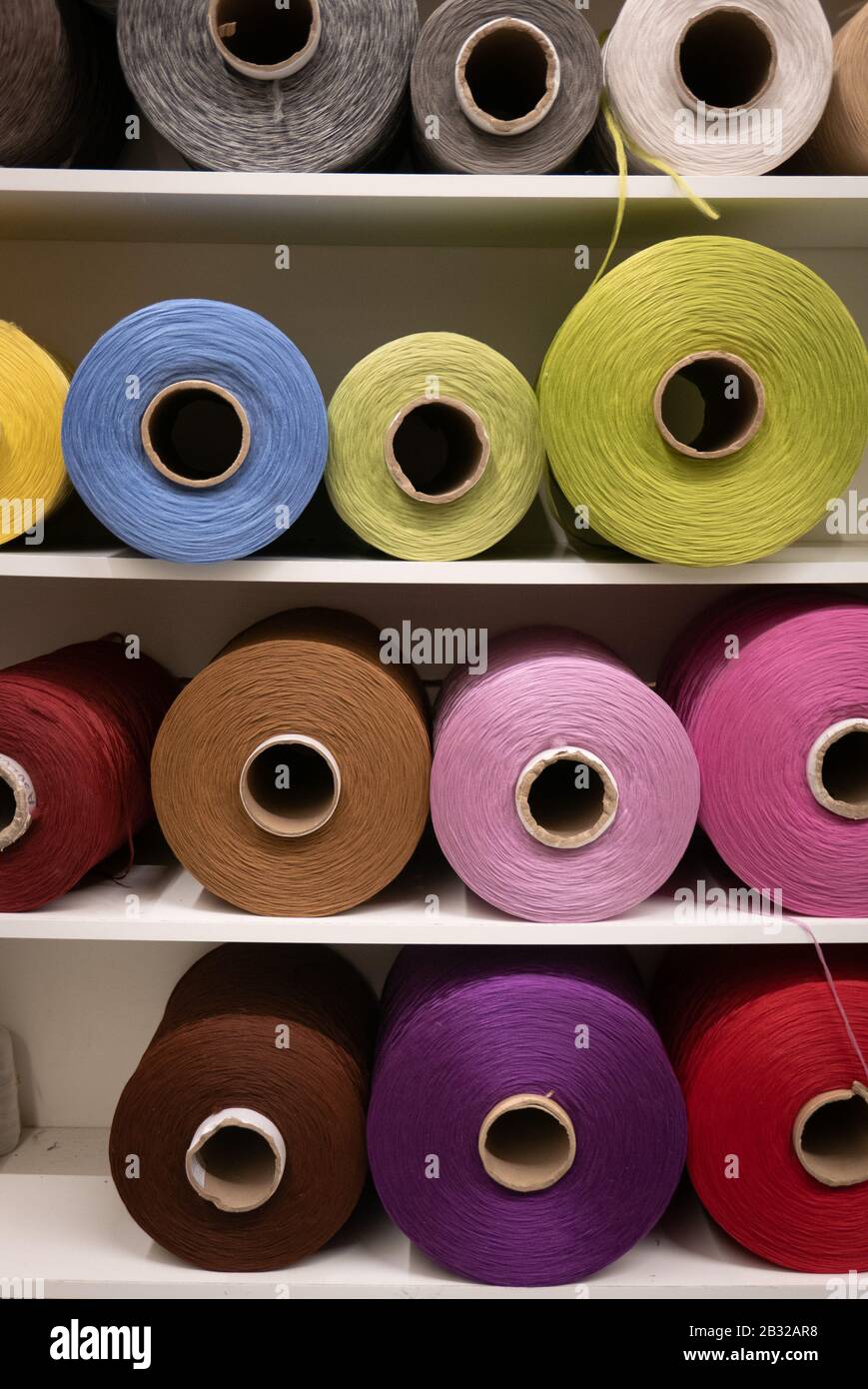 Stack of cotton reels hi-res stock photography and images - Alamy