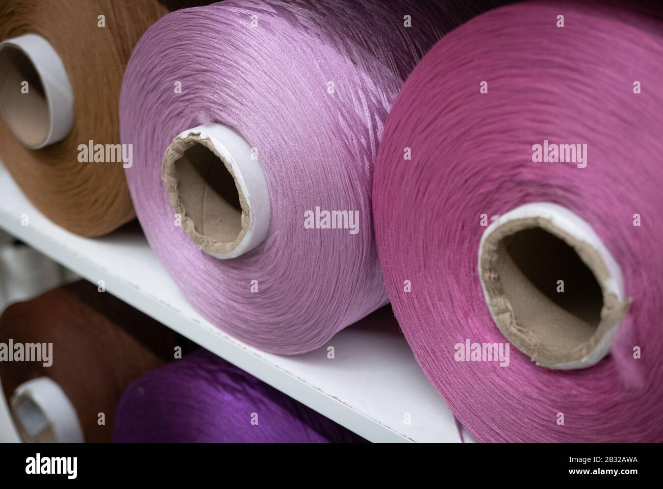 Cotton sewing threaded reels in a sewing shop Stock Photo - Alamy