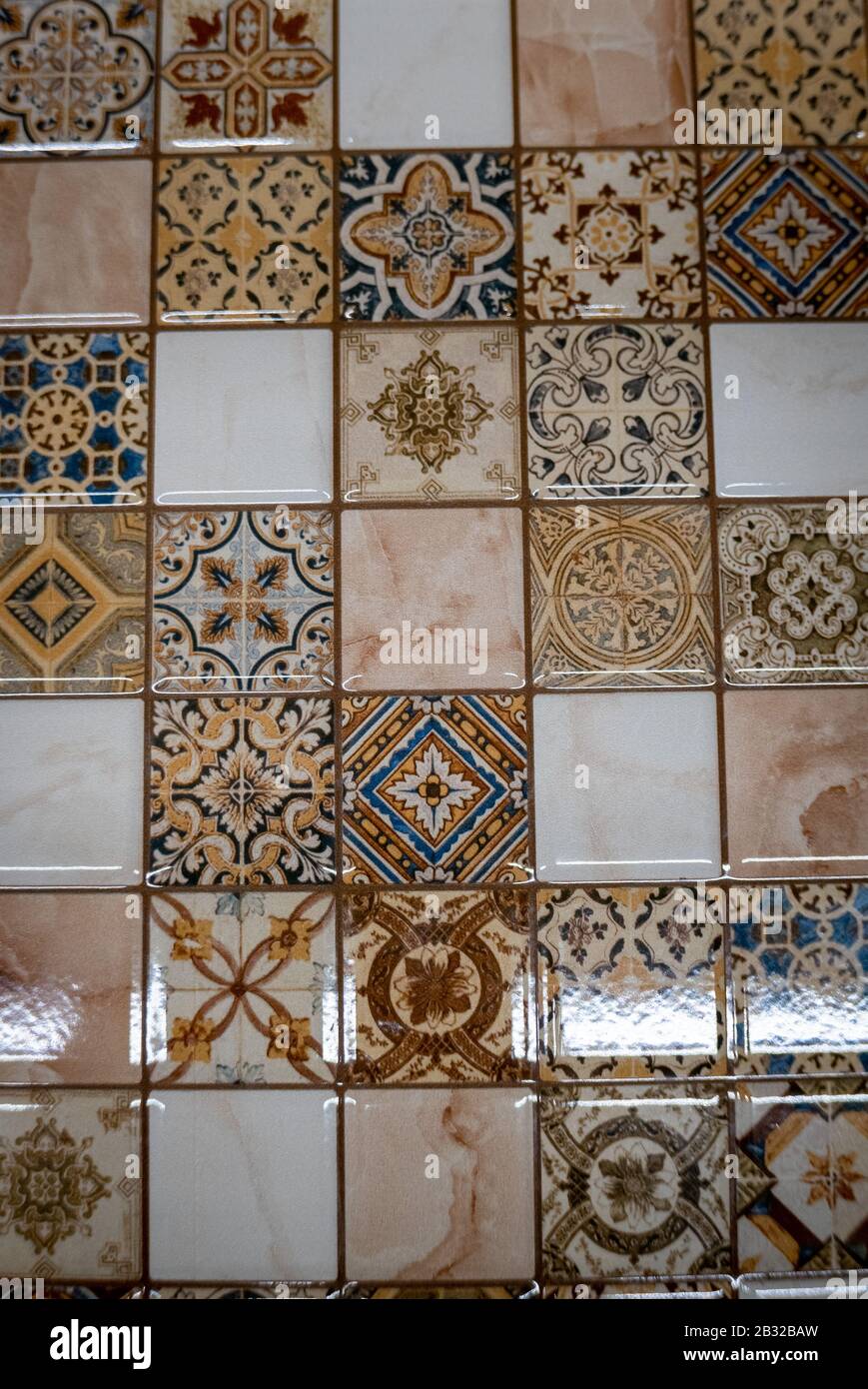 Small tiles of ceramic mosaic on the wall Stock Photo - Alamy