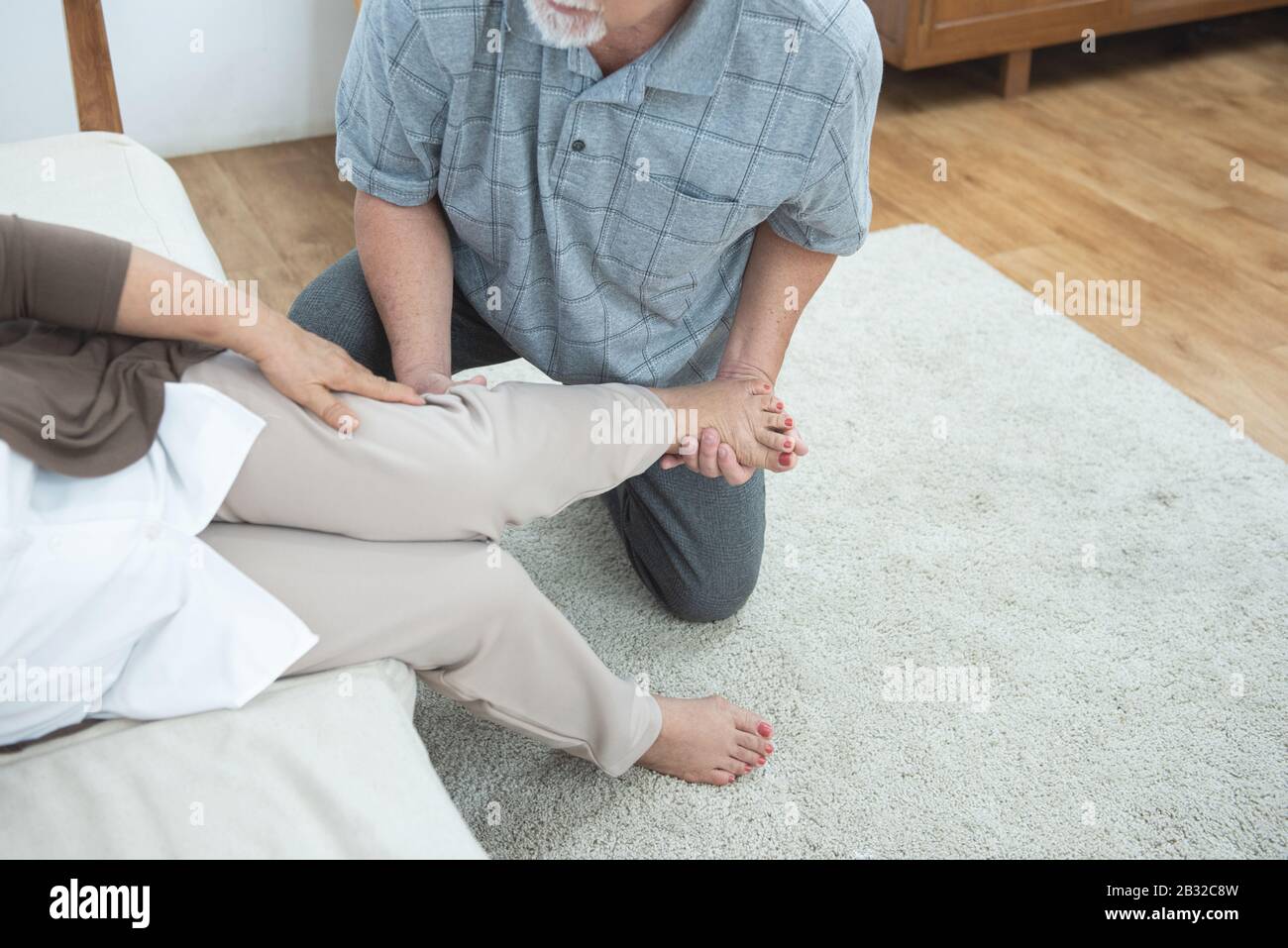 Elderly senior old grandmother fall down leg and ankle pain hurt,sit on ...