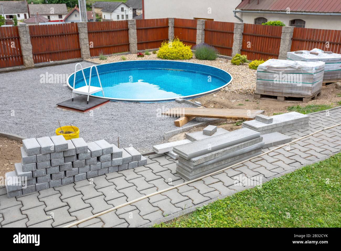 Swimming pool under construction, replacing interlocking pavement in ...