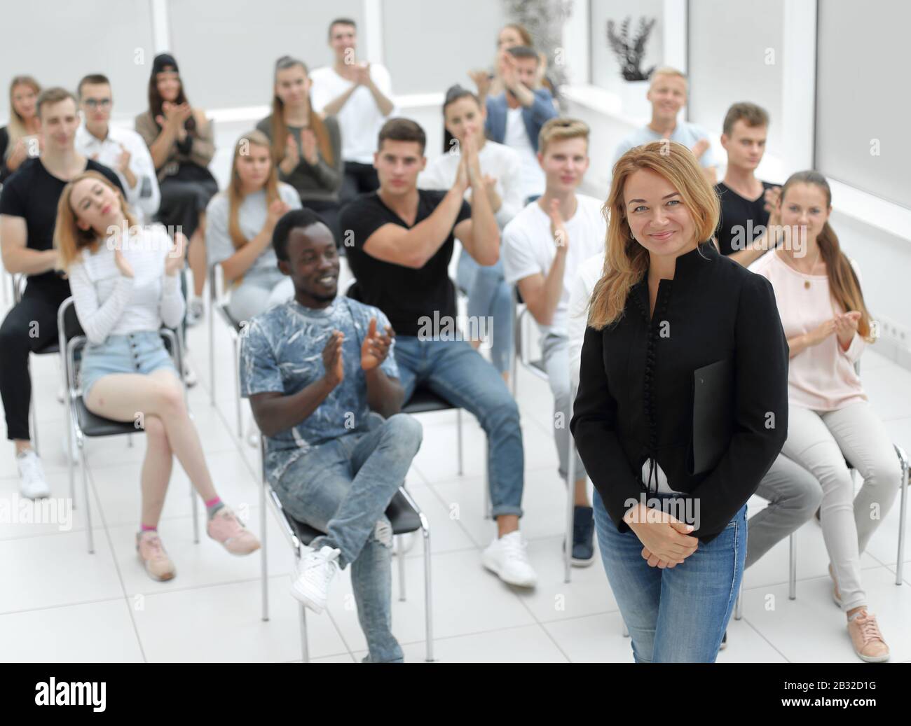 top view. a group of casual young people applauding together Stock ...