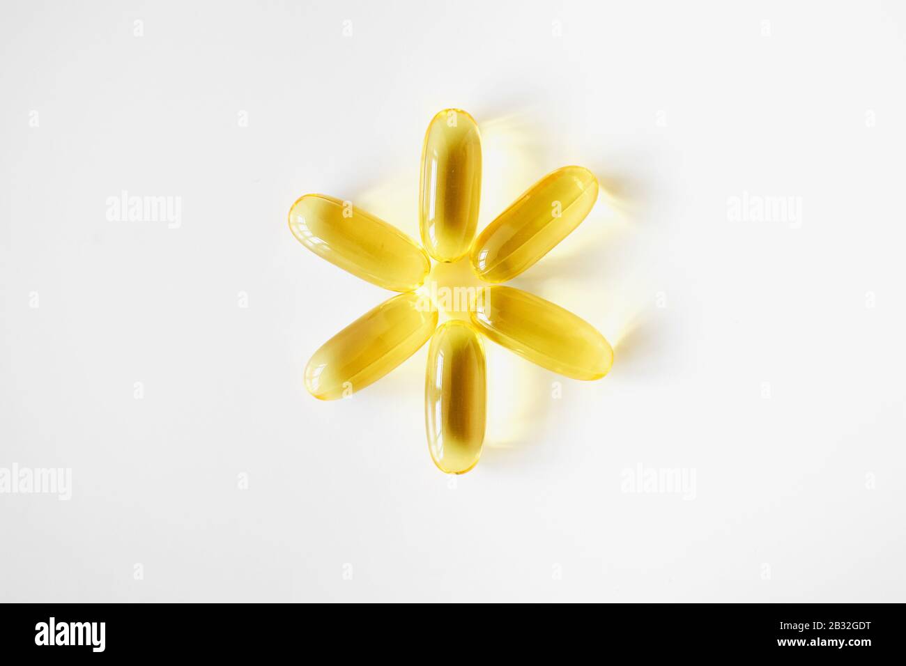 Vitamin capsule flower yellow hi-res stock photography and images - Alamy