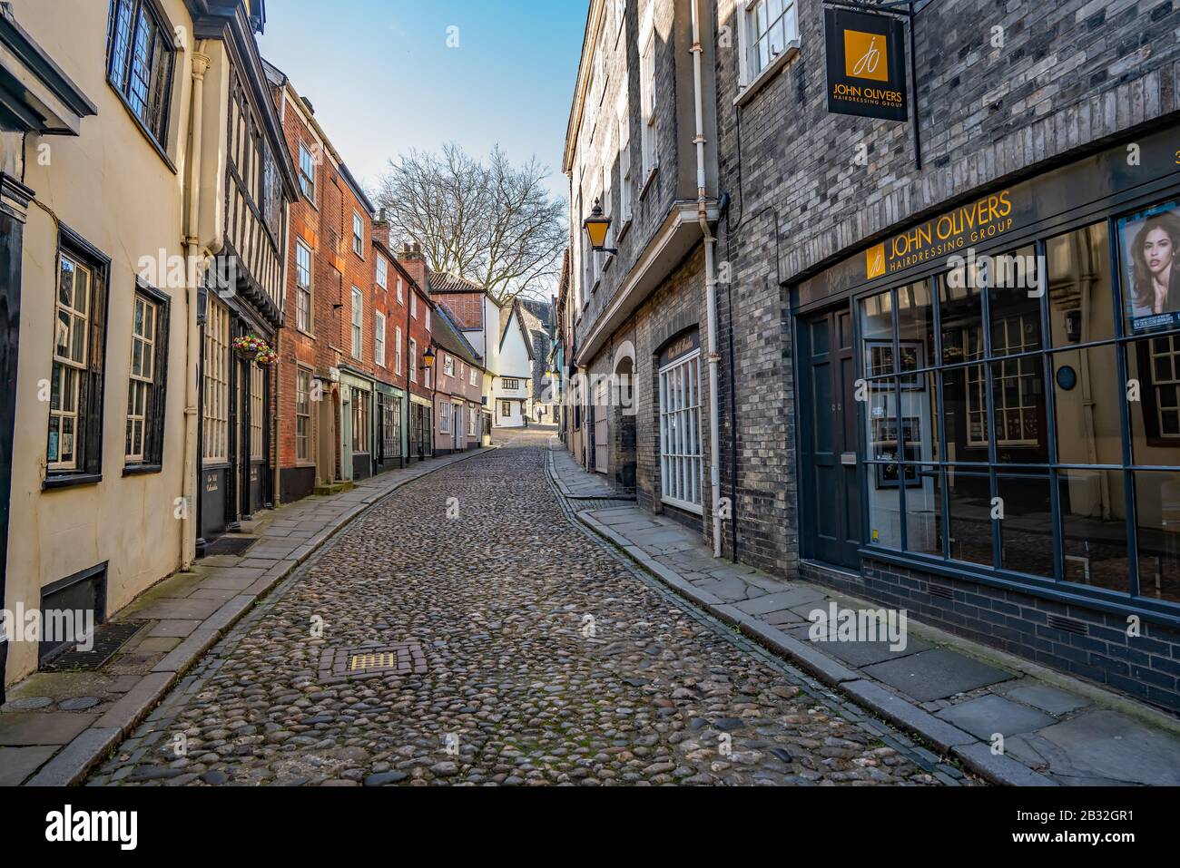 5 Norwich, Norfolk, UK – March 01 2020. A view down the narrow medieval ...