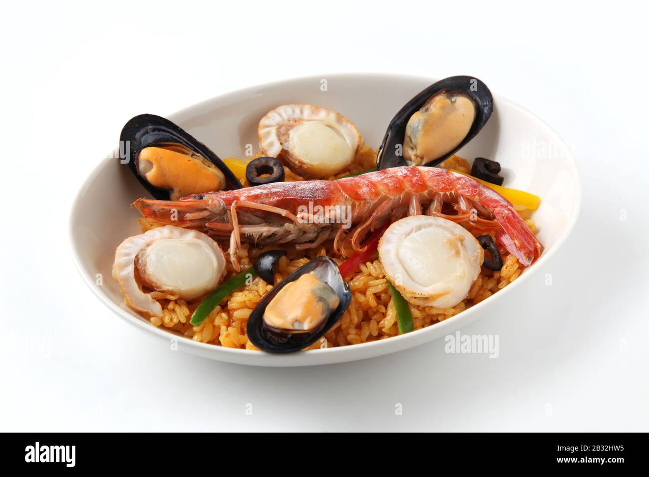 seafood paella rice closeup isolated on white background Stock Photo ...