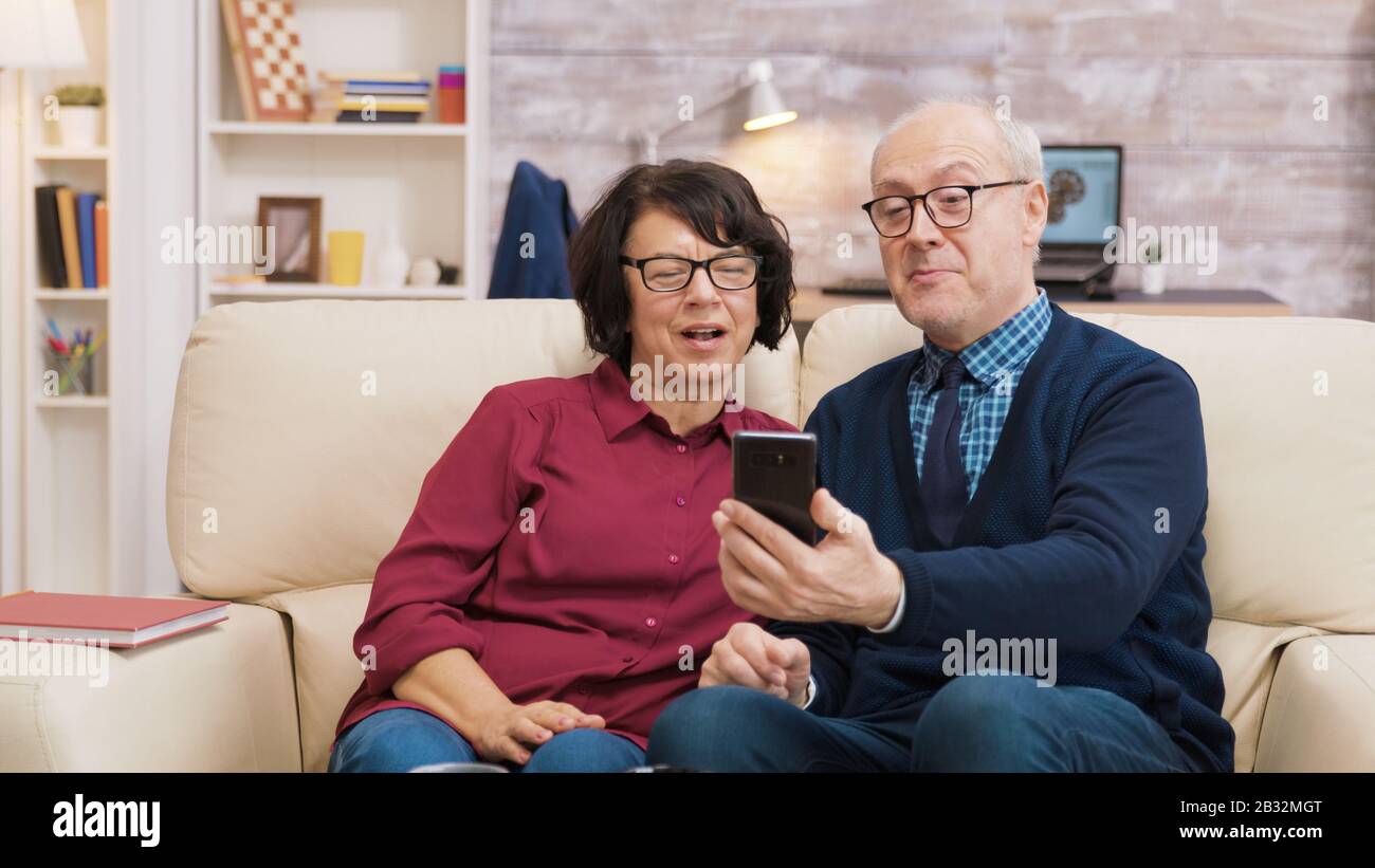 Elderly man having video call hi-res stock photography and images - Alamy