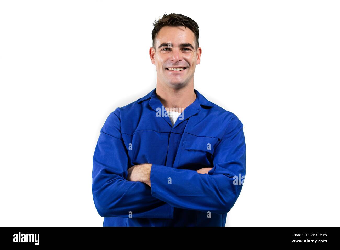 Portrait of a Caucasian male engineer standing on white background ...