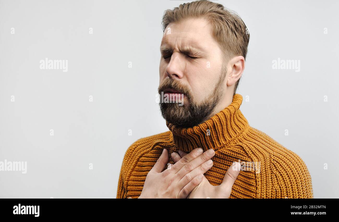 Coughing man portrait Stock Photo - Alamy