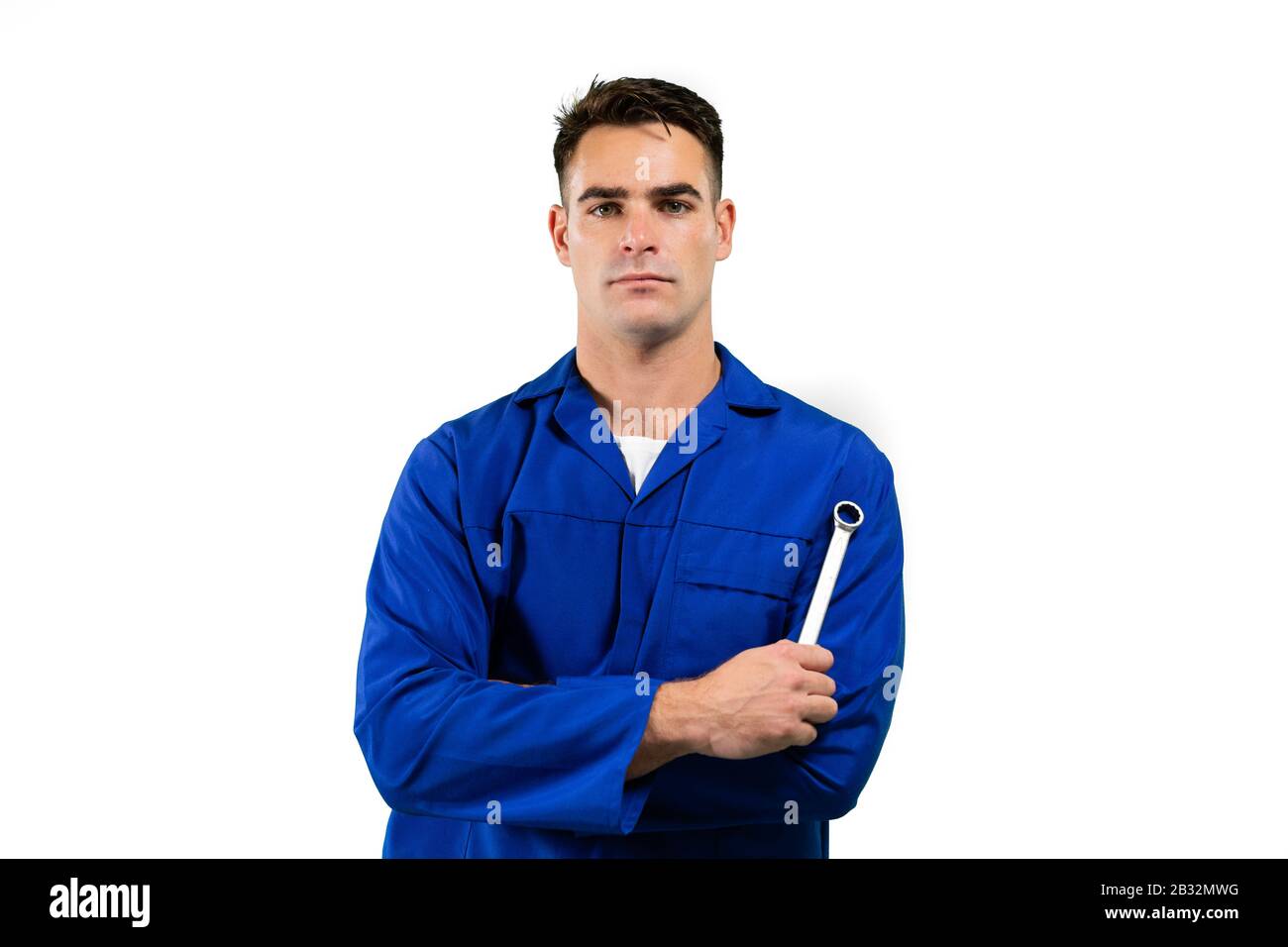 Portrait of a Caucasian male engineer standing on white background ...